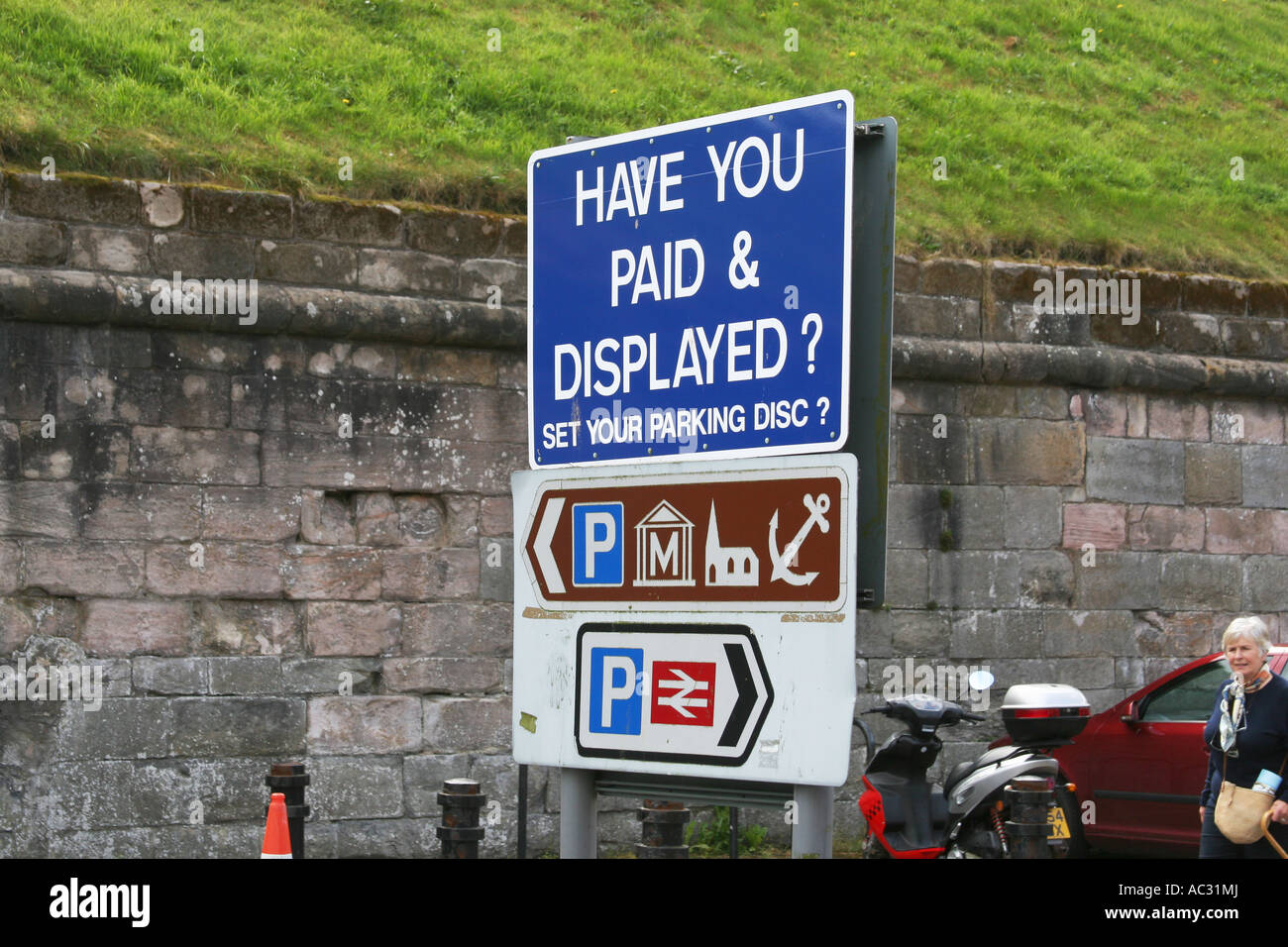 Pay and display car park sign with other town center and monument signs ...