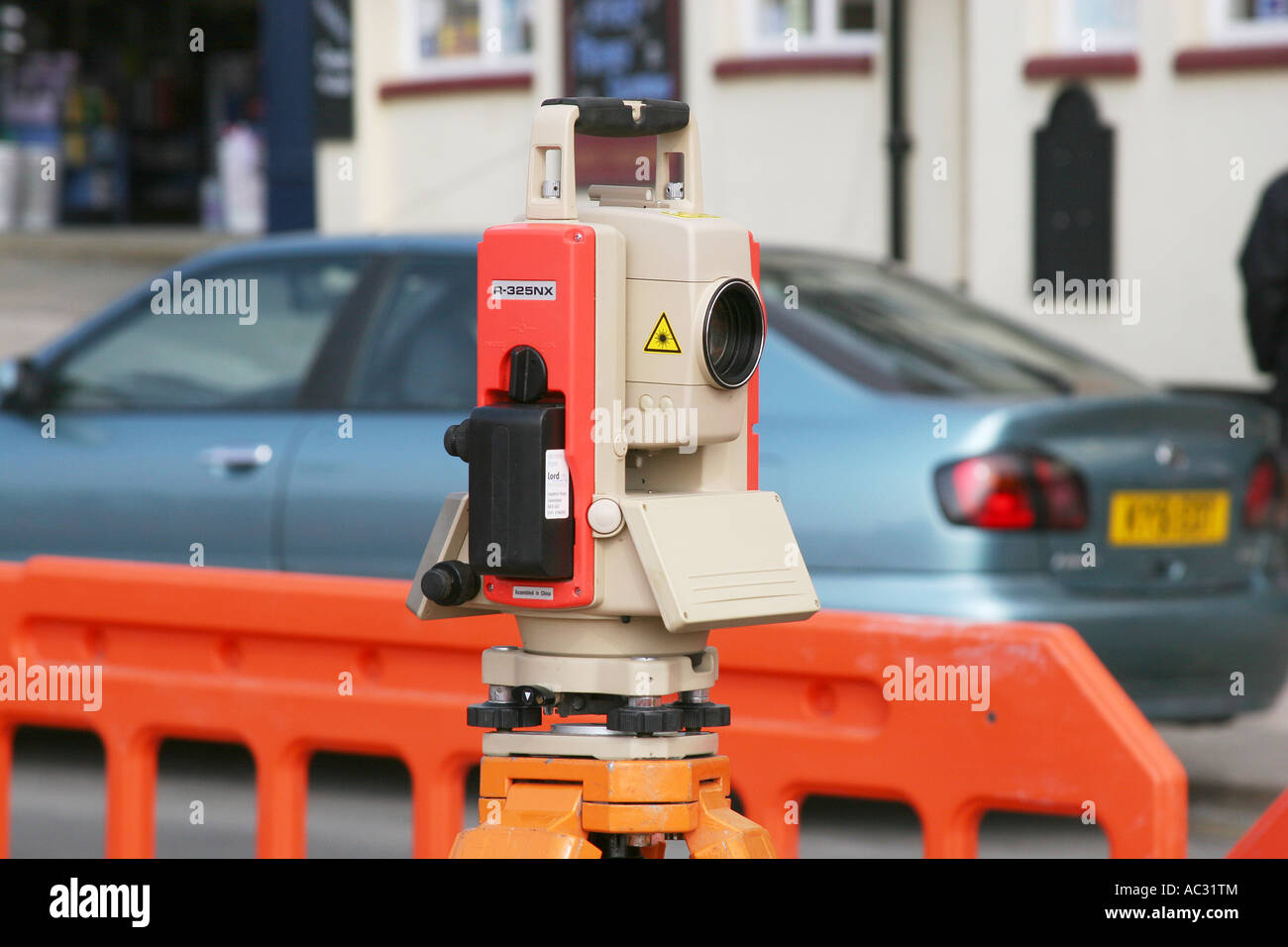 Modern electronic surveyors theodolite on tripod in the street Stock ...