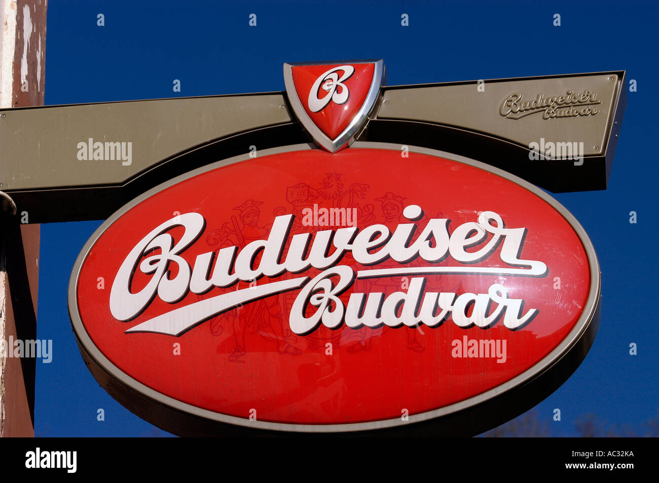 A red Budweiser Budvar beer sign outside a bar in the South Czech ...
