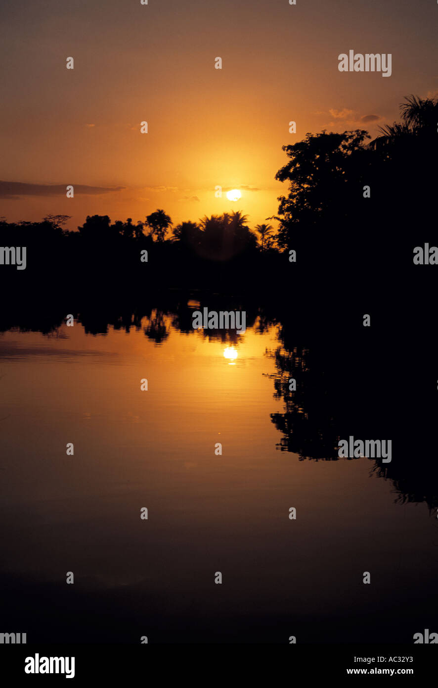 tropical dawn/dusk reflected on a caribbean island Stock Photo - Alamy