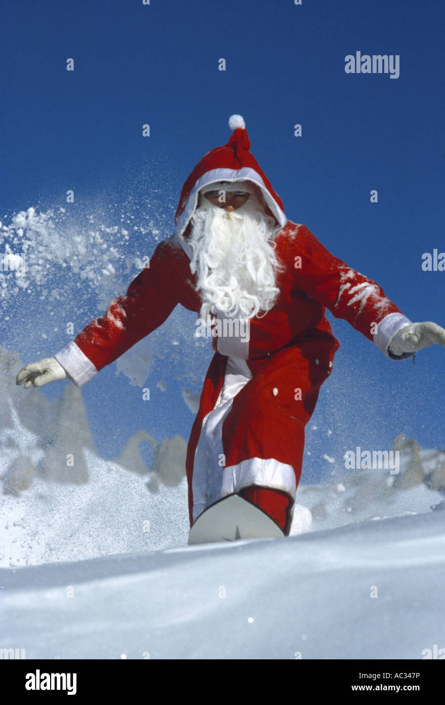 Santa Claus on snowboard, France, Alps Stock Photo - Alamy