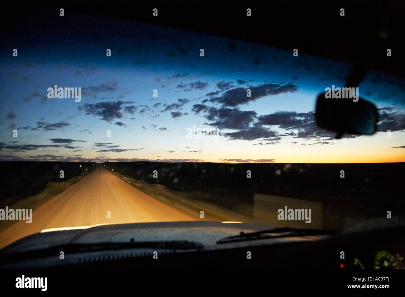 Dusk on dirt road near Mungo National Park Outback New South Wales ...