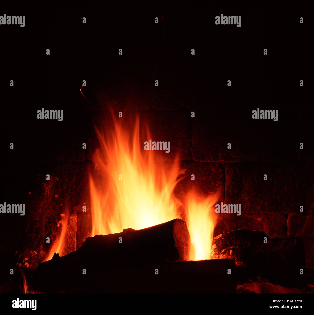 Log Fire in Fireplace Stock Photo - Alamy