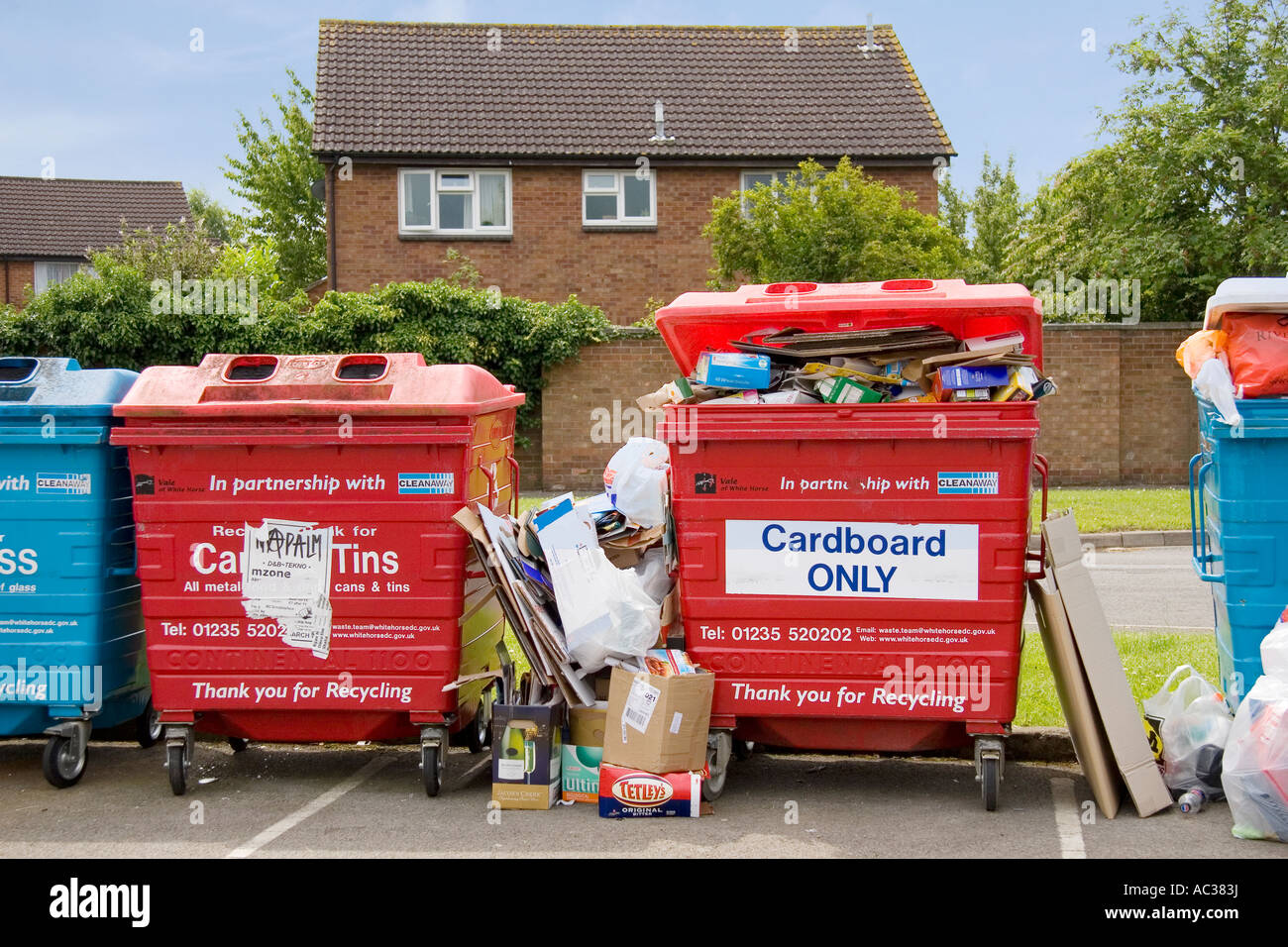 Overflowing waste recycling point in Oxfordshire housing estate 7 Stock ...