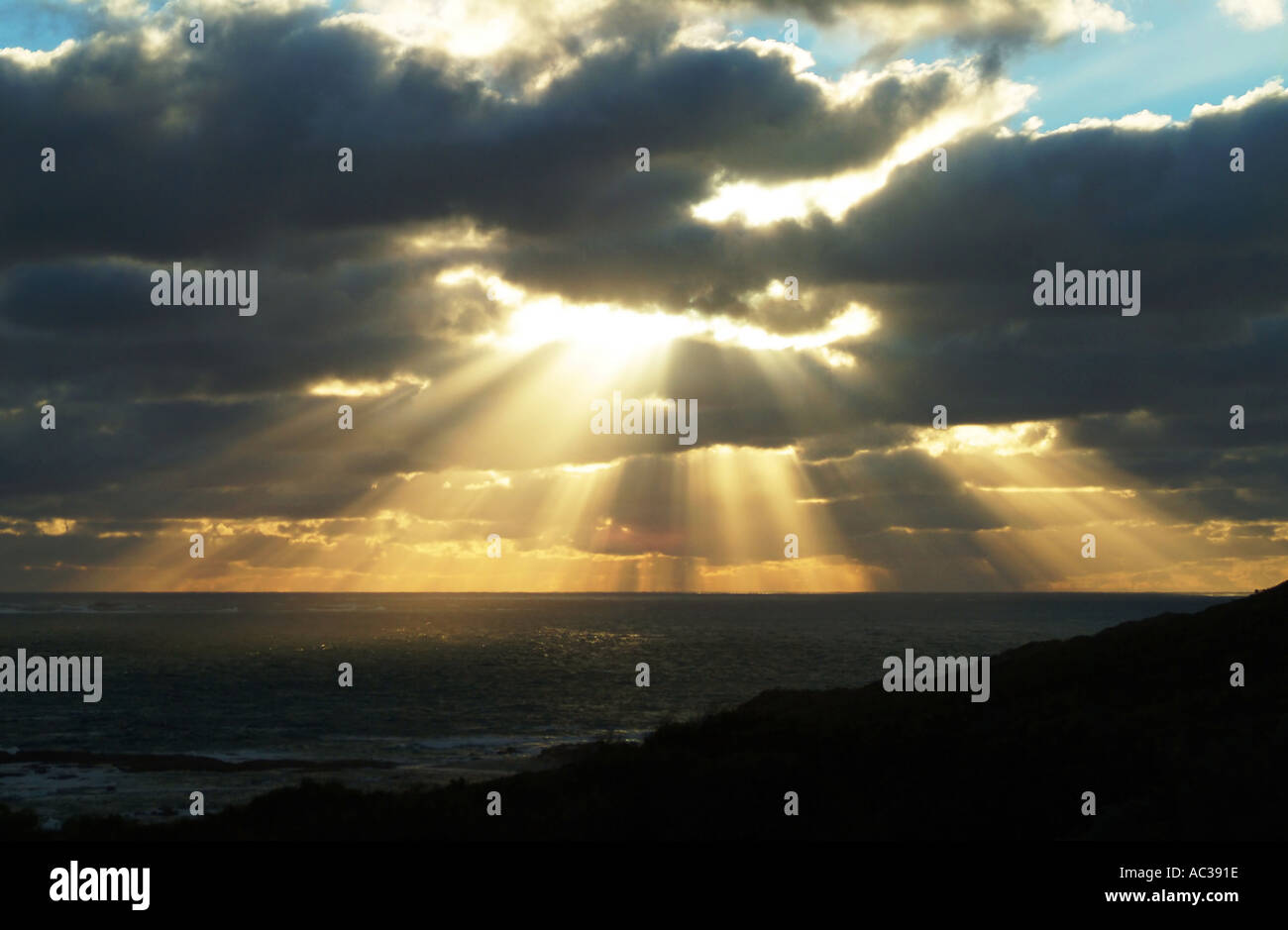 sun rays over the Indian ocean Stock Photo - Alamy