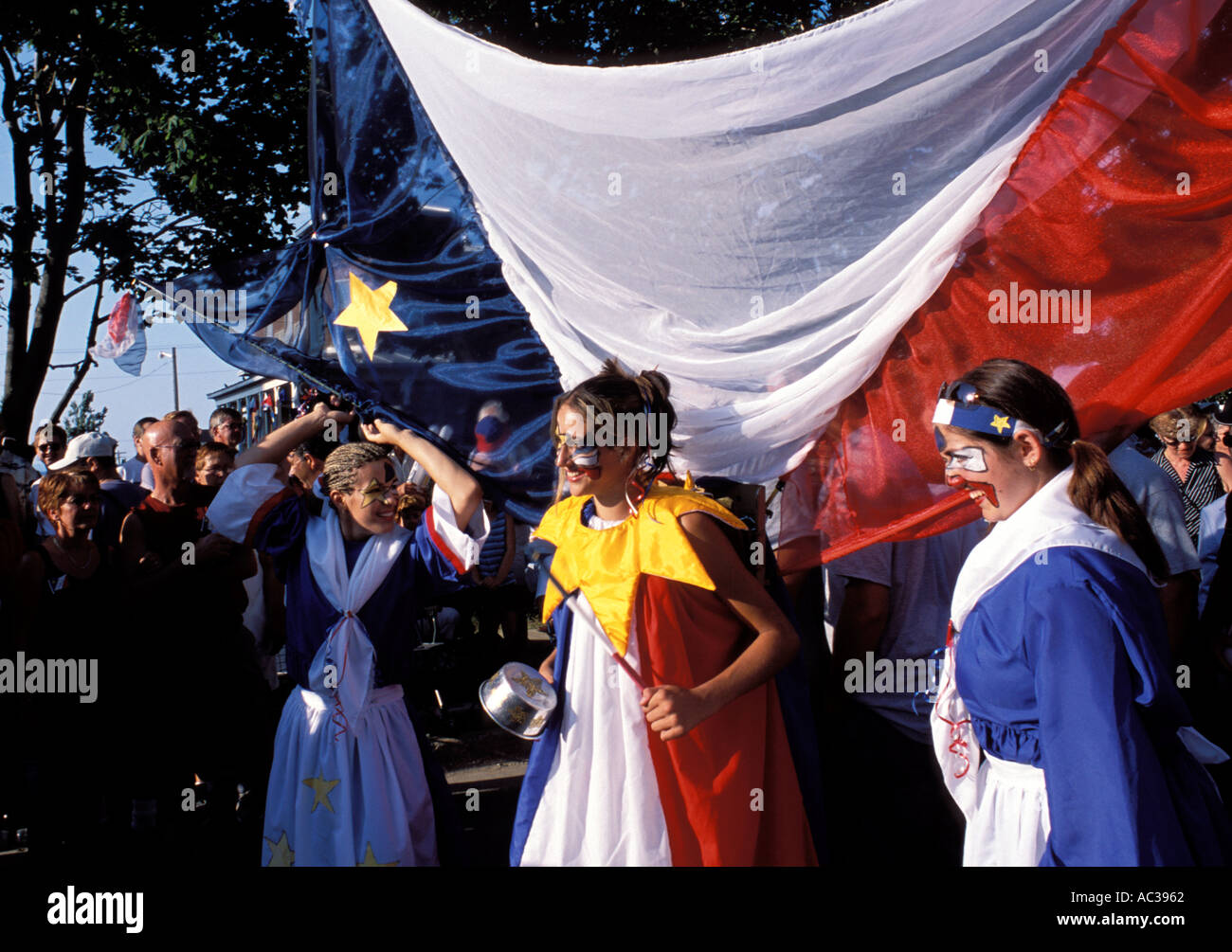 the young women dressed up like the Acadien Flag during the Tintamarre ...