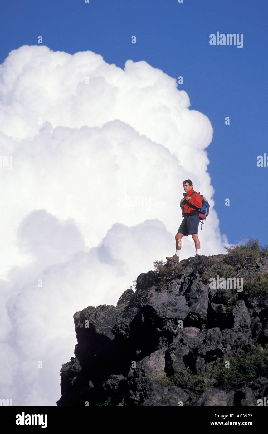 Male Hiker Standing on Rocky Crag Stock Photo - Alamy