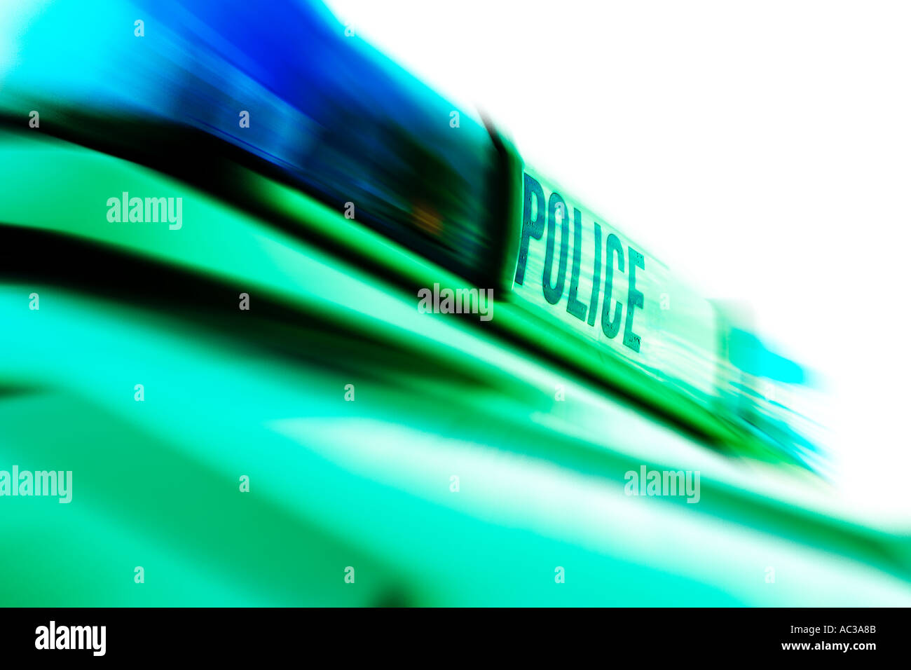 Police roof top car sign blurred due to the speed with the words police ...