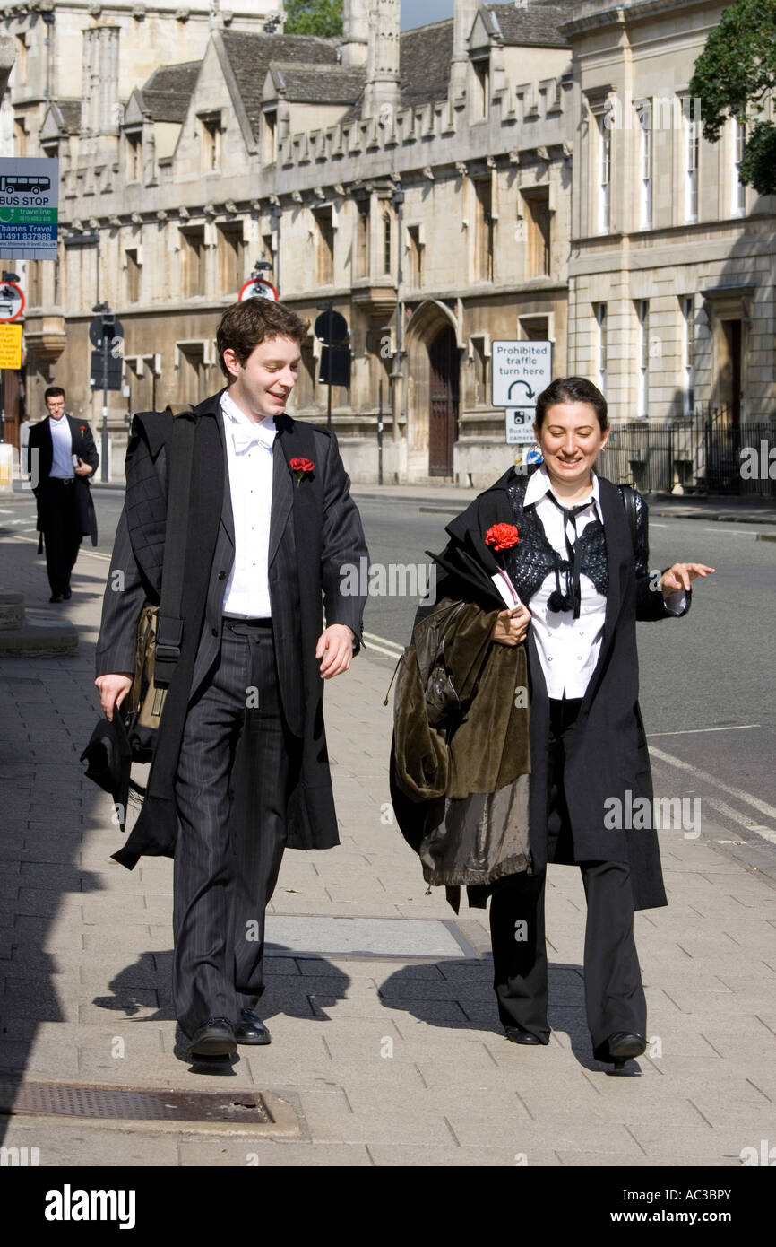 Gowned Oxford students talking in the street Stock Photo - Alamy