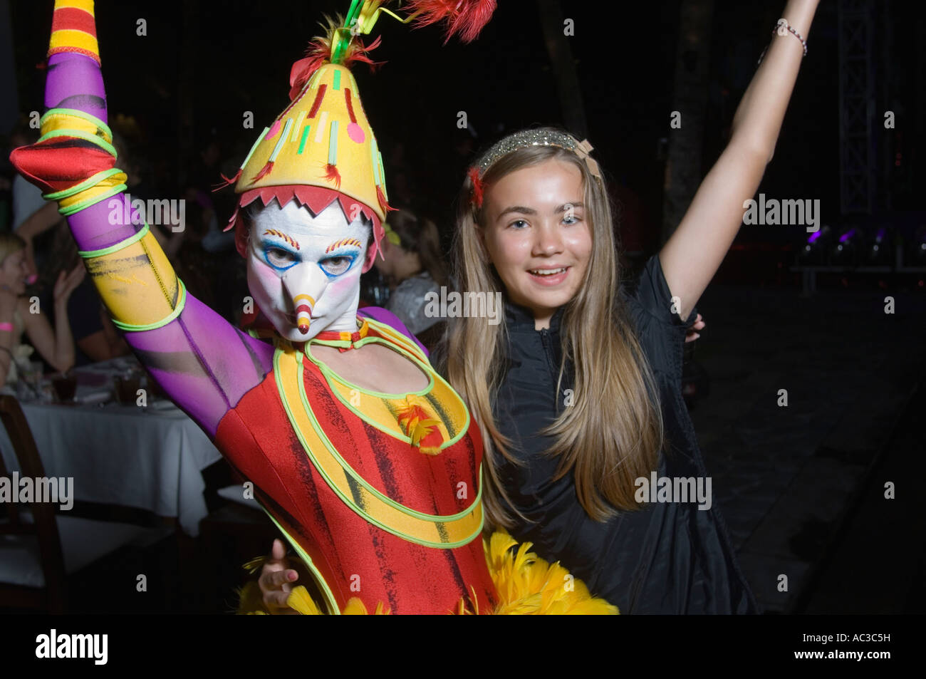 girl posing with circus clown Stock Photo - Alamy