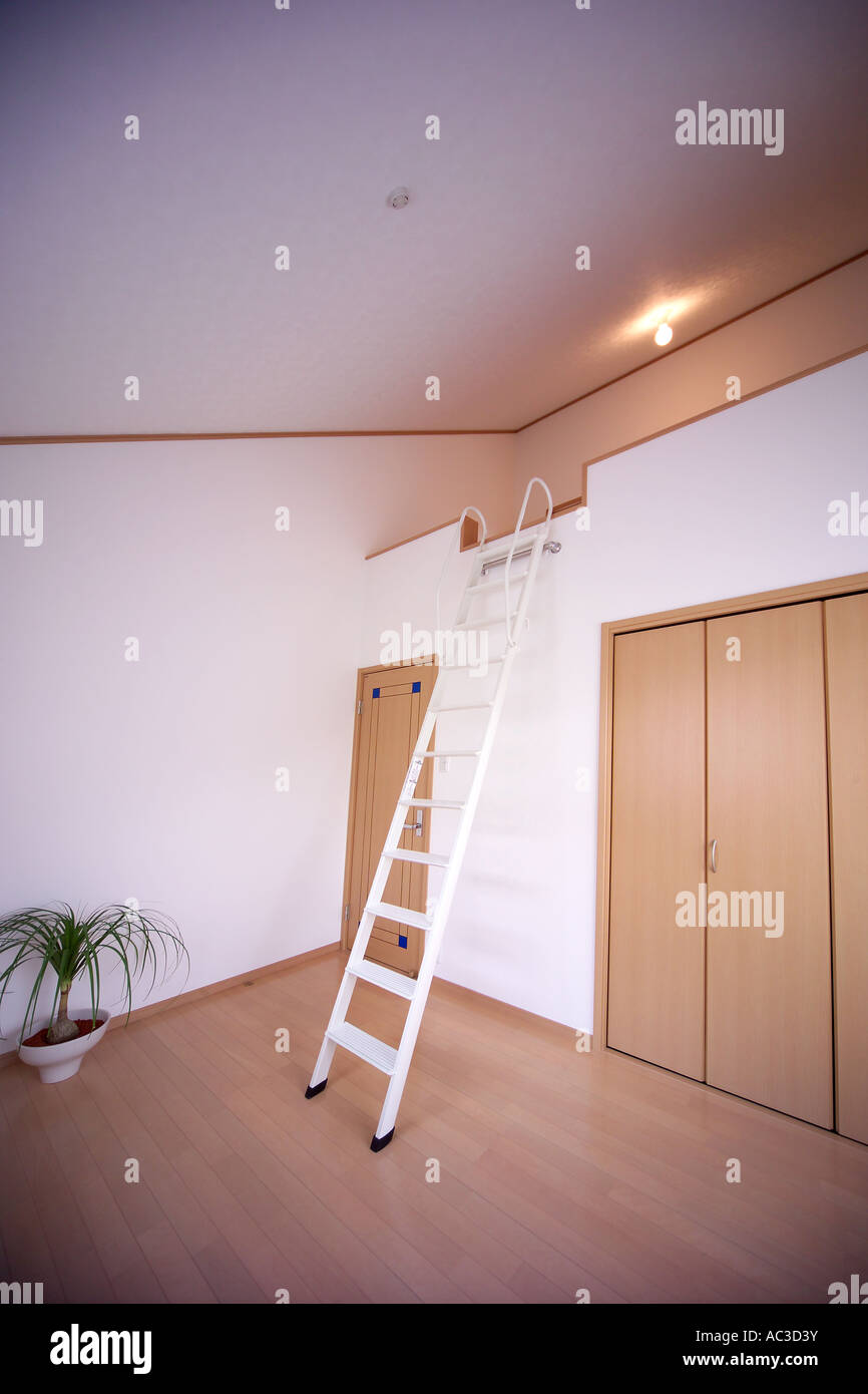 Ladder in a room Stock Photo - Alamy