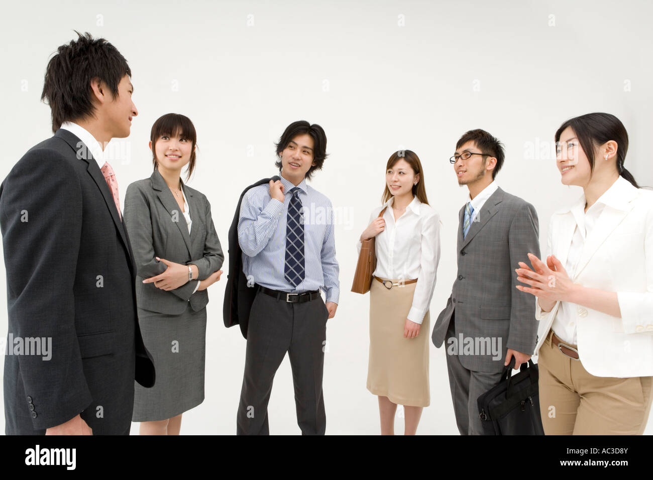 Business people talking Stock Photo - Alamy