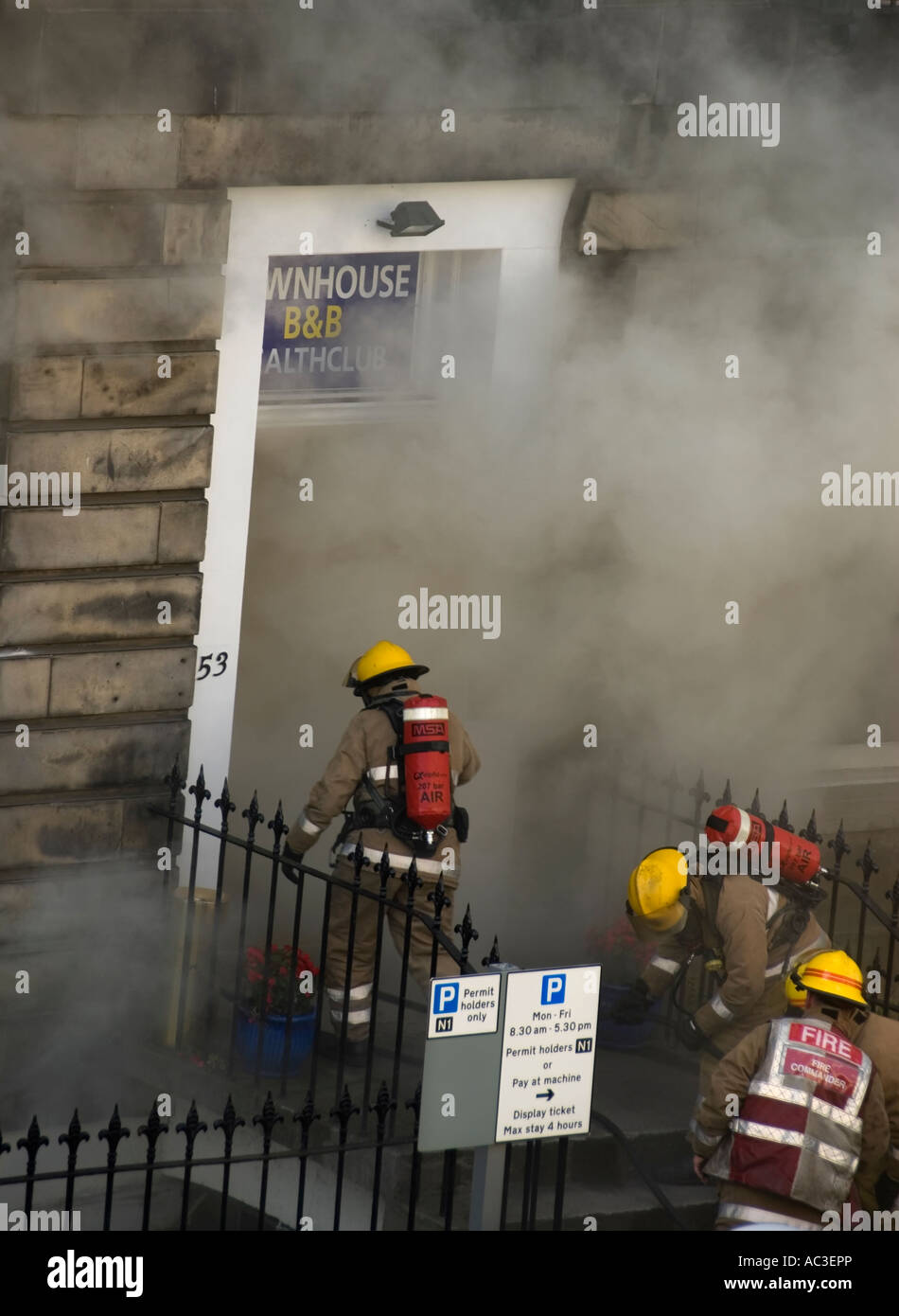 Fireman in action uk hi-res stock photography and images - Alamy