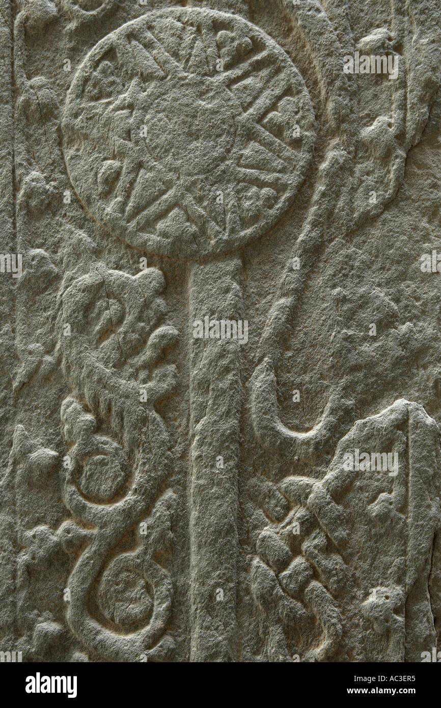 Sword and shield on West Highland grave slab Stock Photo - Alamy