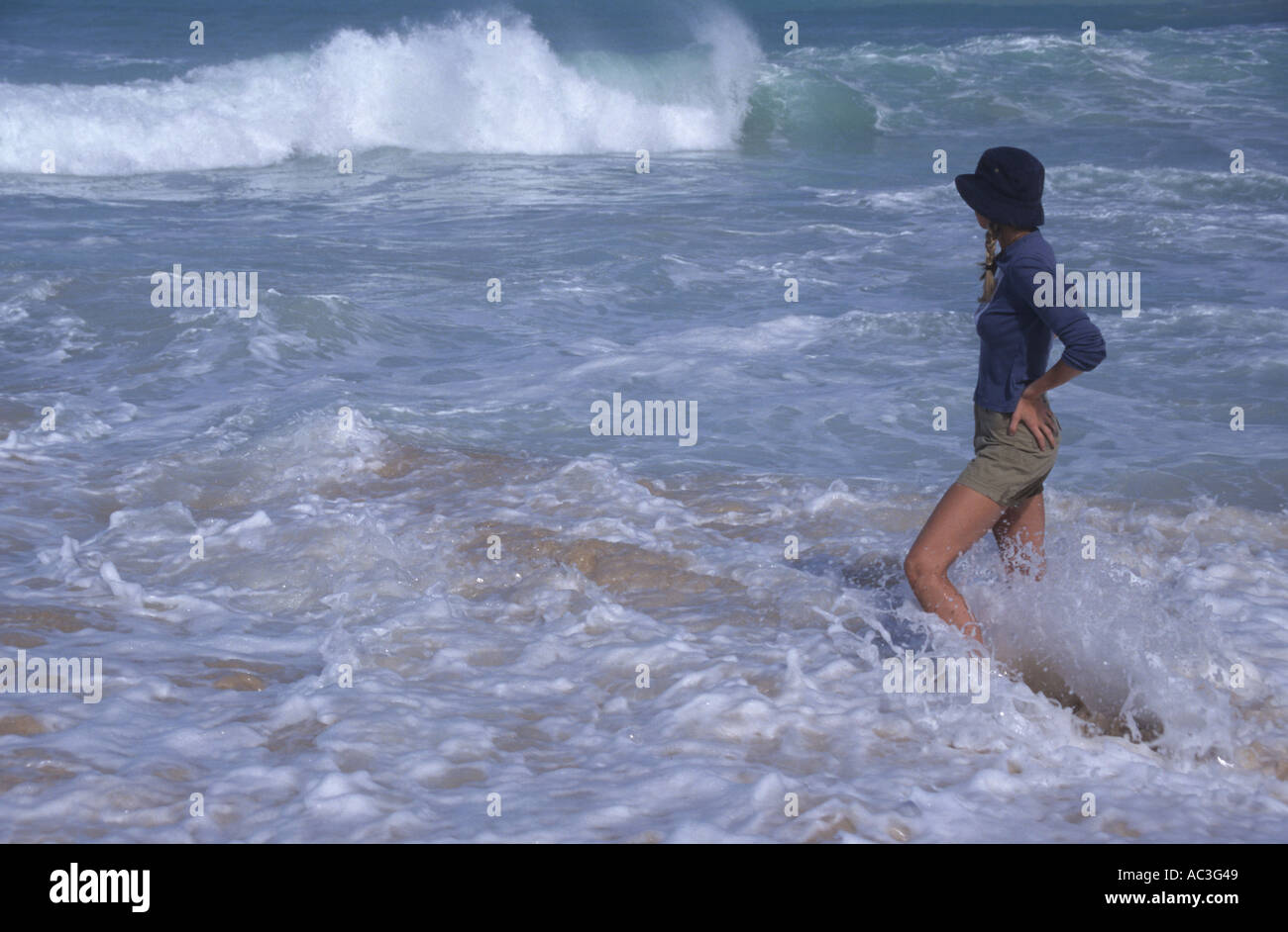 Girl in waves Stock Photo - Alamy