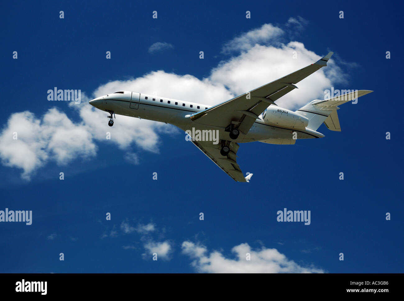 Private Jet flying overhead Stock Photo - Alamy