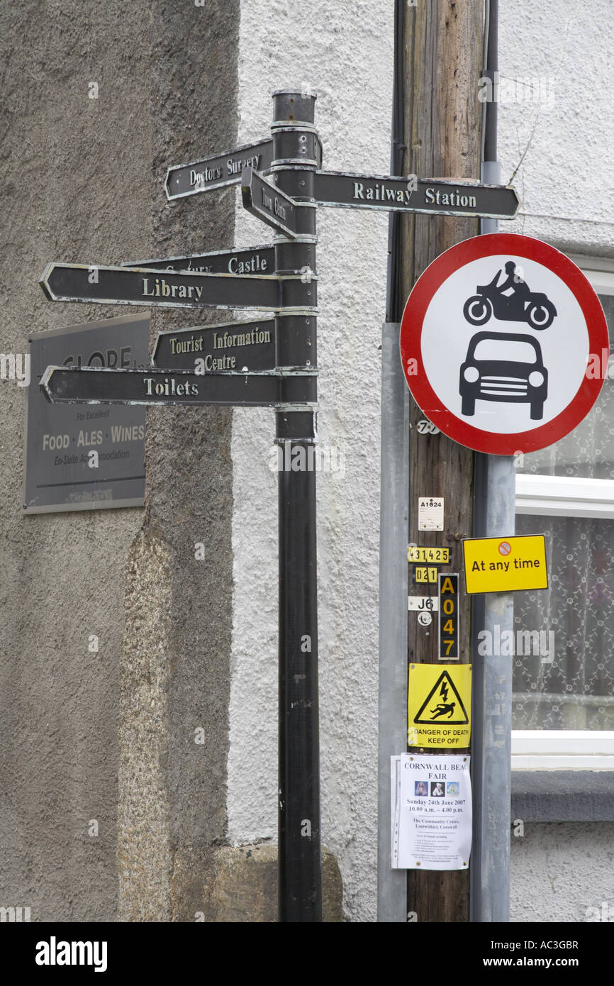 Tourist direction sign and road signs Stock Photo - Alamy