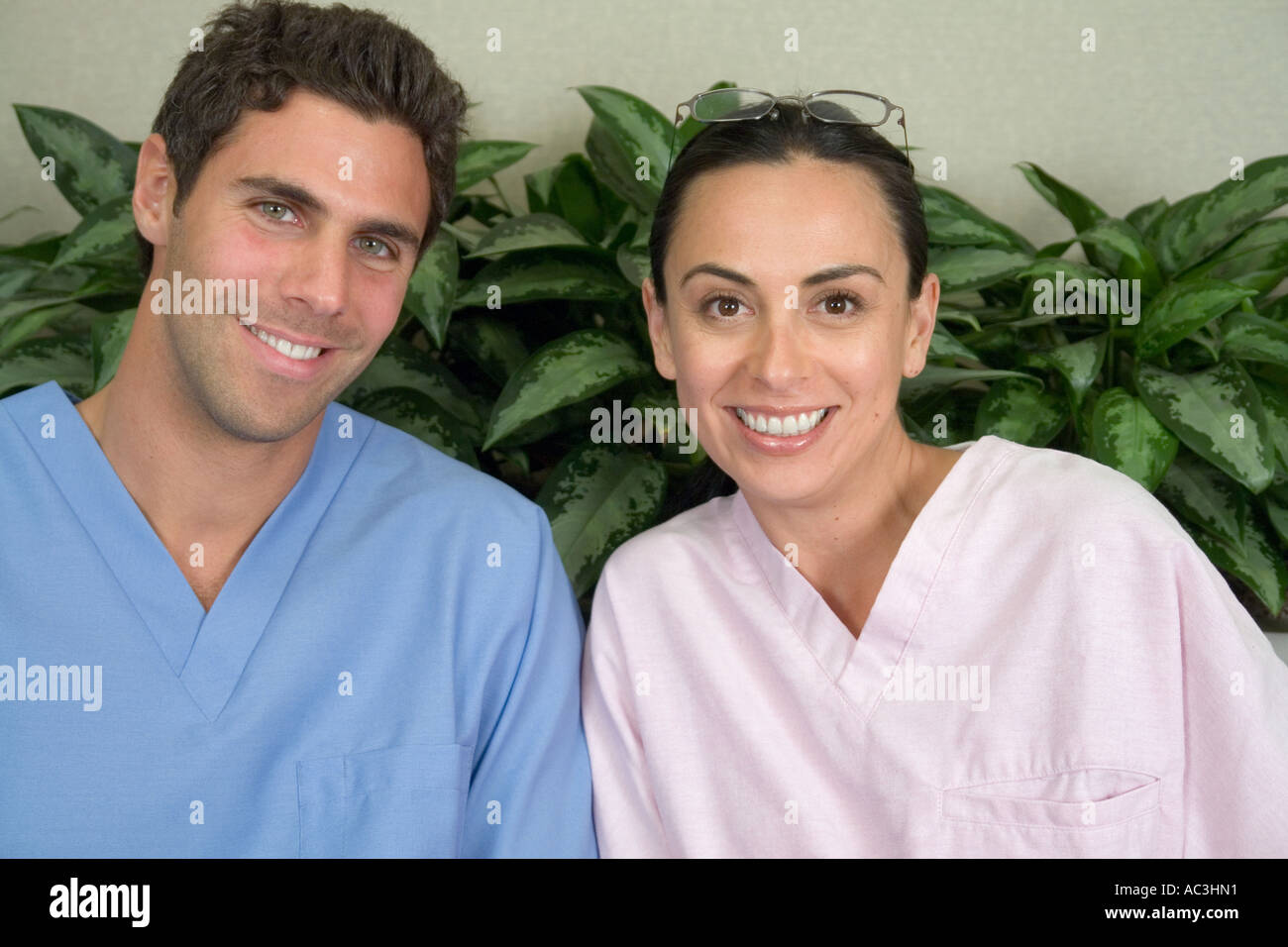 Portrait of two young adult nurses Stock Photo - Alamy