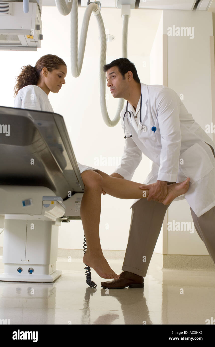 African doctor patient touch hi-res stock photography and images - Alamy