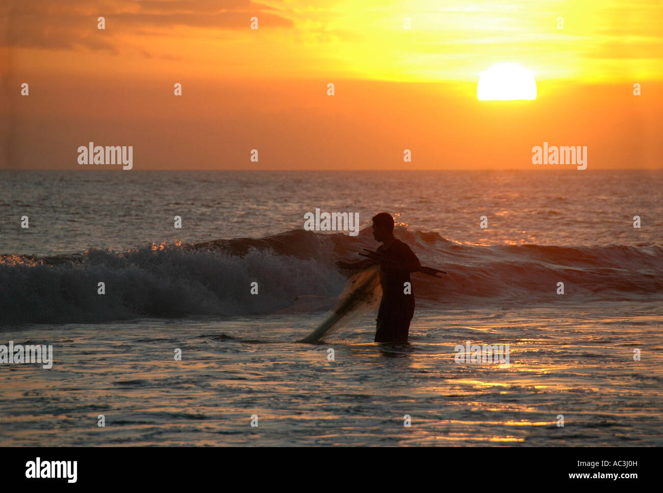 Bali Indonesia Net fishermen Fishing from the beach of Seminyak Bali ...