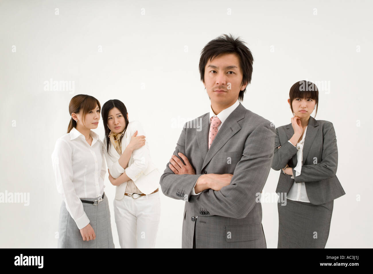 Man woman standing looking Cut Out Stock Images & Pictures - Alamy