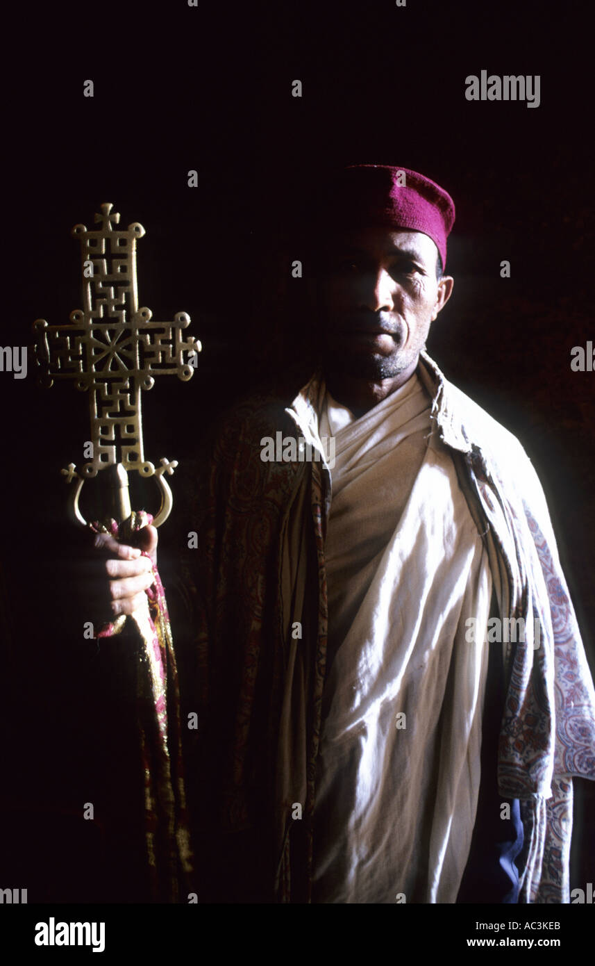 Ethiopian priest with Holy Cross in one of the rock hewn churches of ...