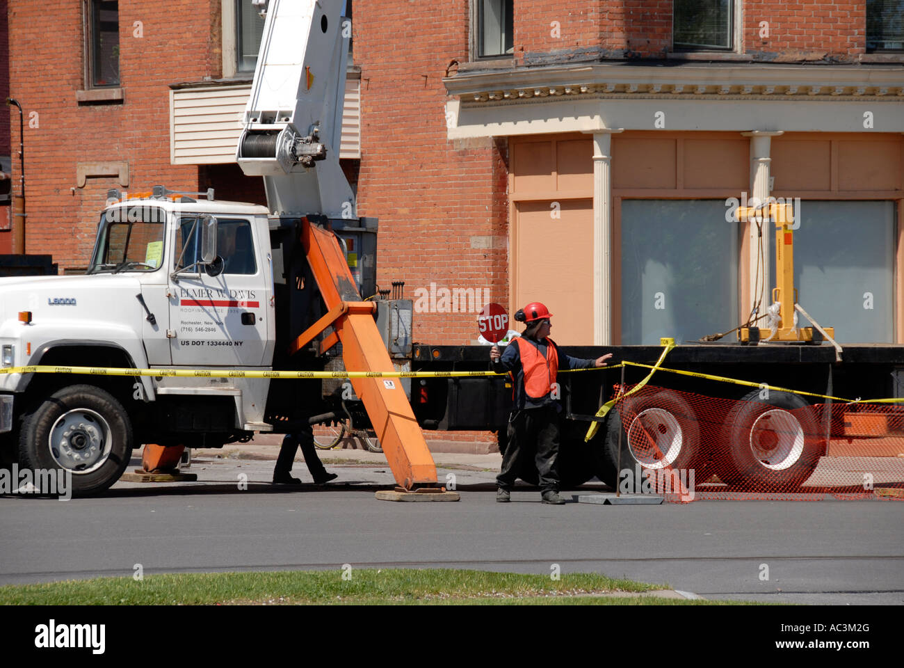 Directing traffic, stop sign Stock Photo - Alamy