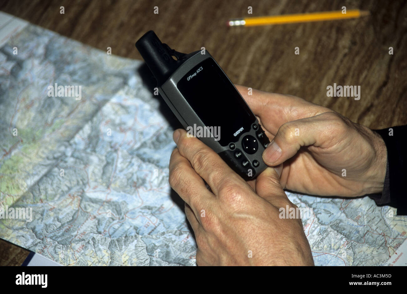 Handheld gps and maps hi-res stock photography and images - Alamy