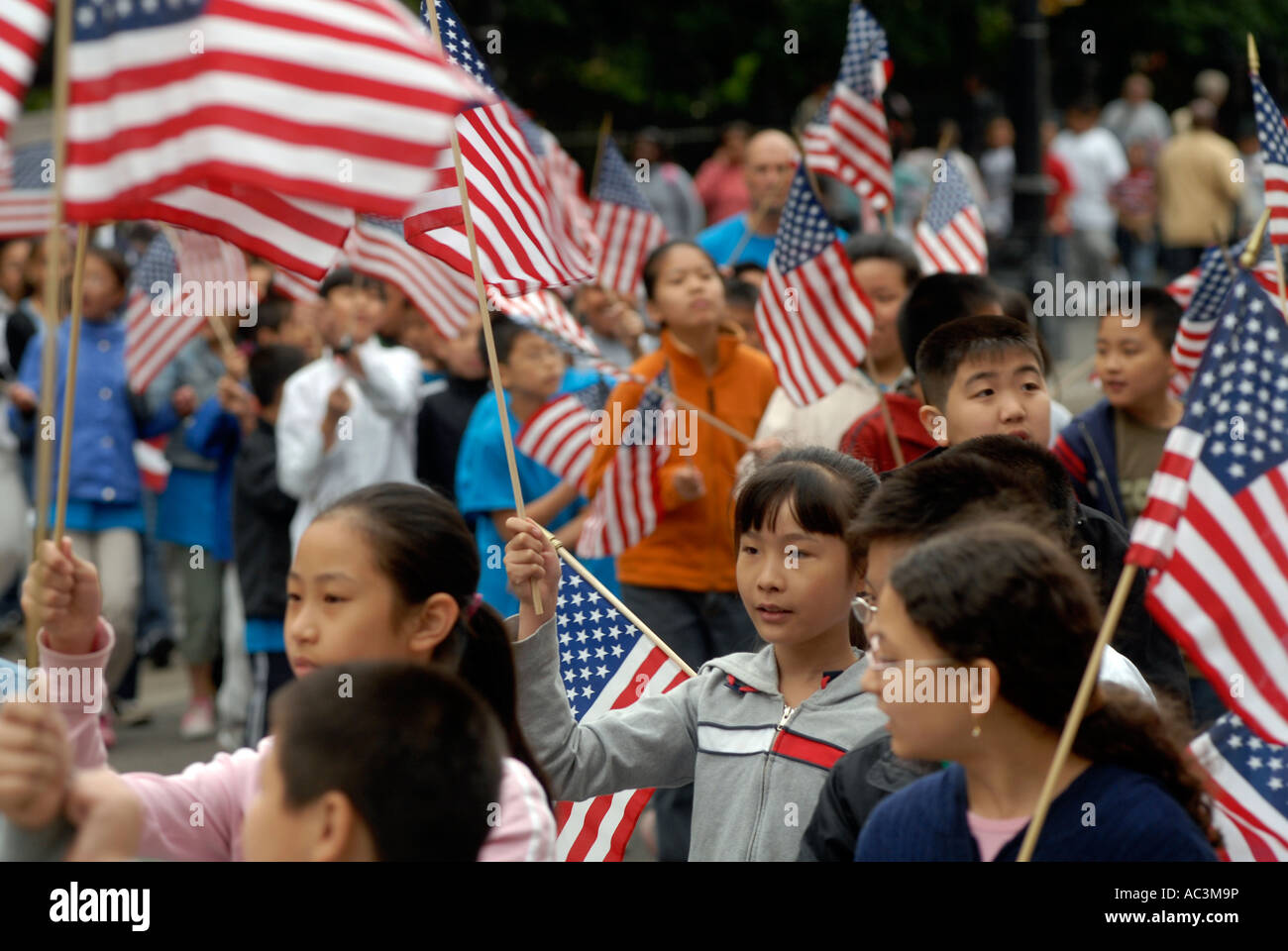 Multi ethnic group crowd parade usa hi-res stock photography and images ...