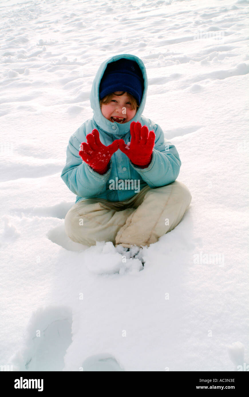 Playing In The Snow Stock Photo - Alamy