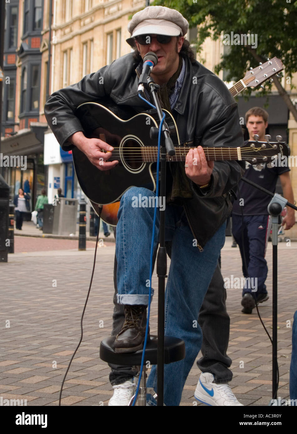 A Singer Plays His Guitar on St Peters Gate, at the City Pulse Music ...