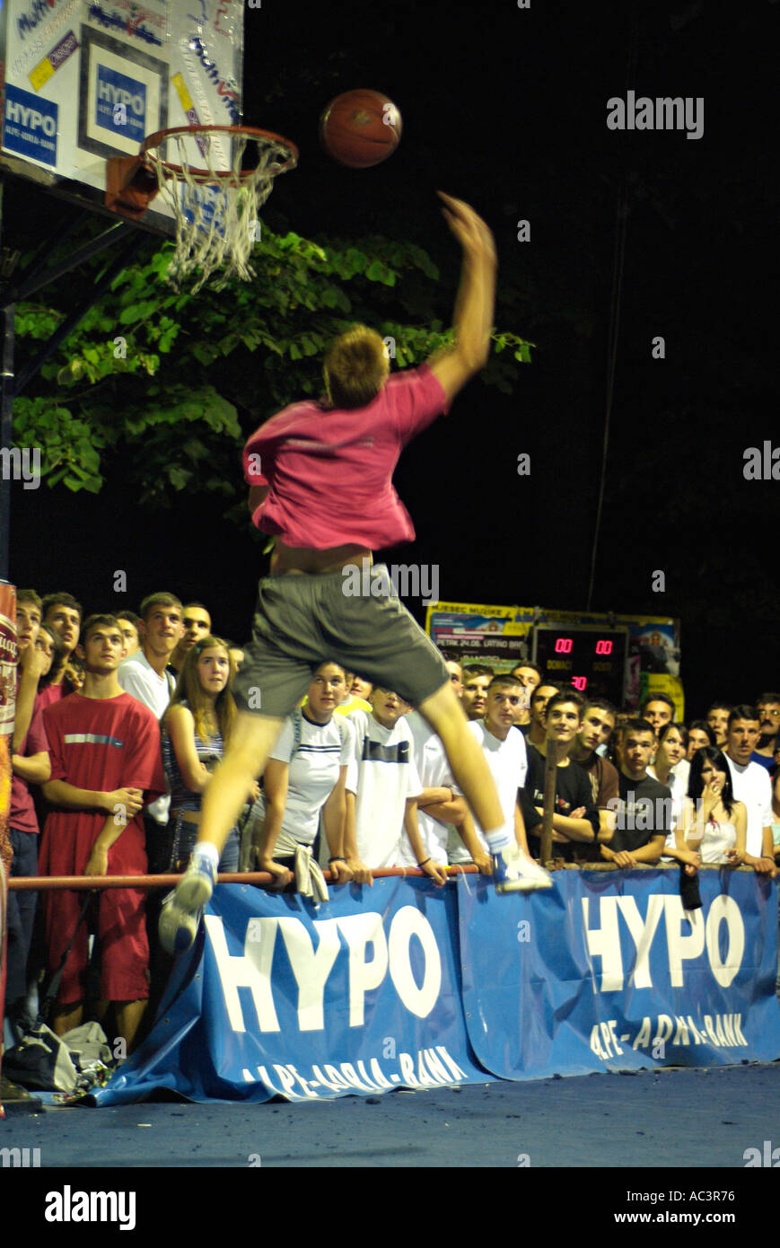 Basketball Player Shooting a Ball into a Hoop Stock Photo - Alamy