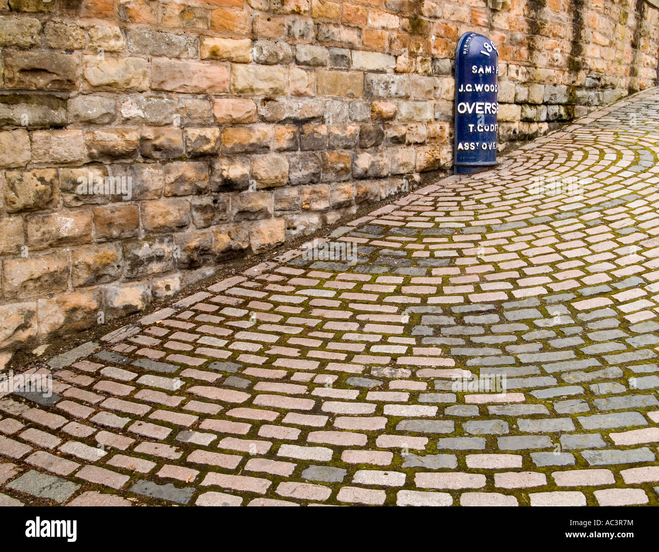 A semi circle pattern of bricks on the road outside Nottingham Castle ...