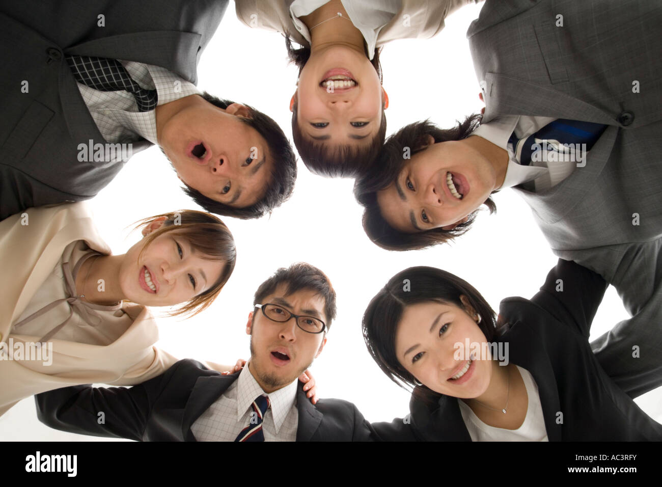 Huddled circle hi-res stock photography and images - Alamy