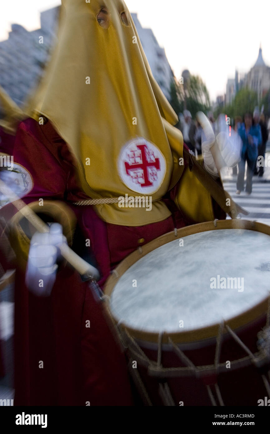 Penitent beating drum, Easter religious procession, Semana Santa, Holy ...