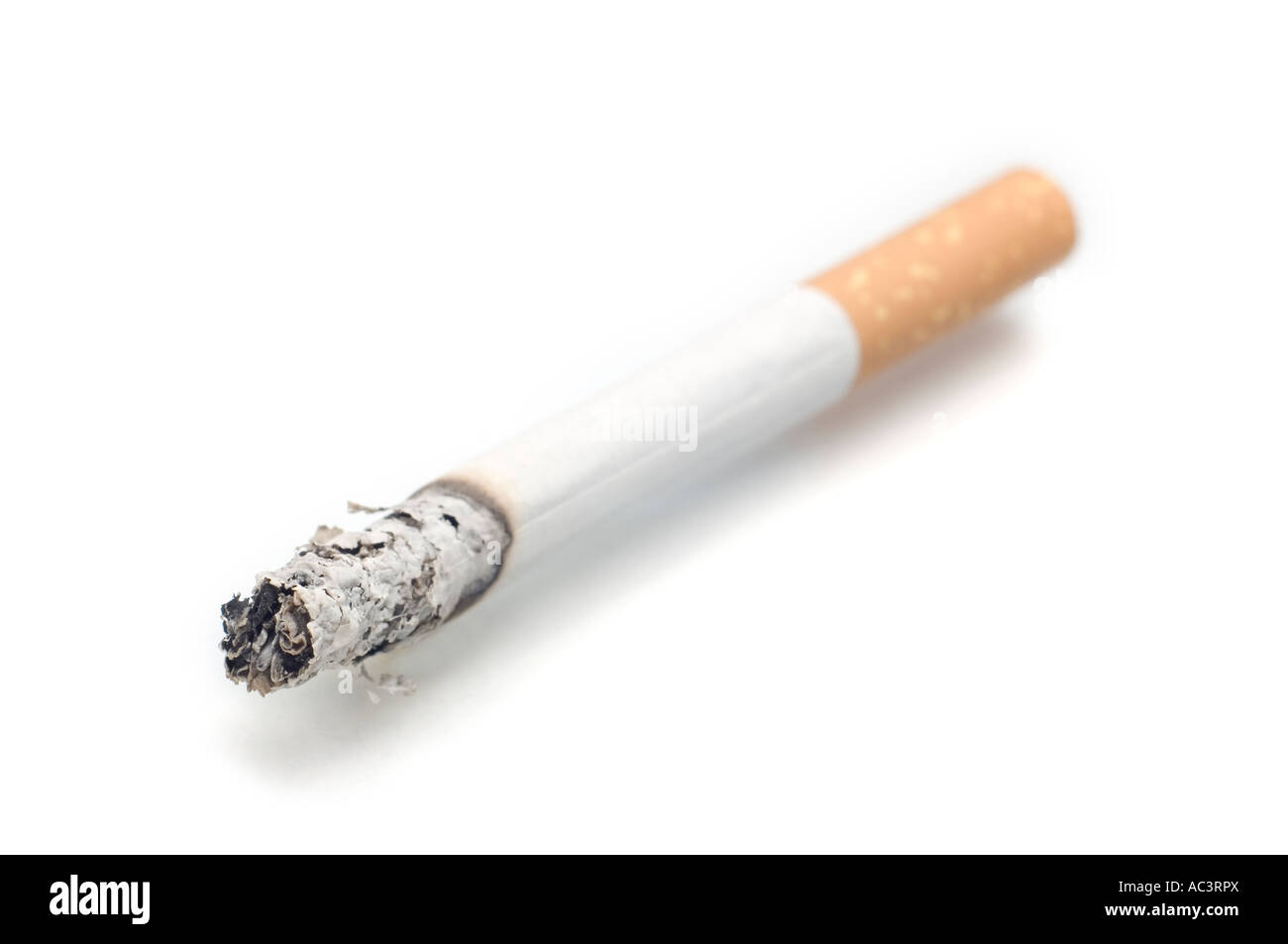 Cigarette on a white background Stock Photo - Alamy