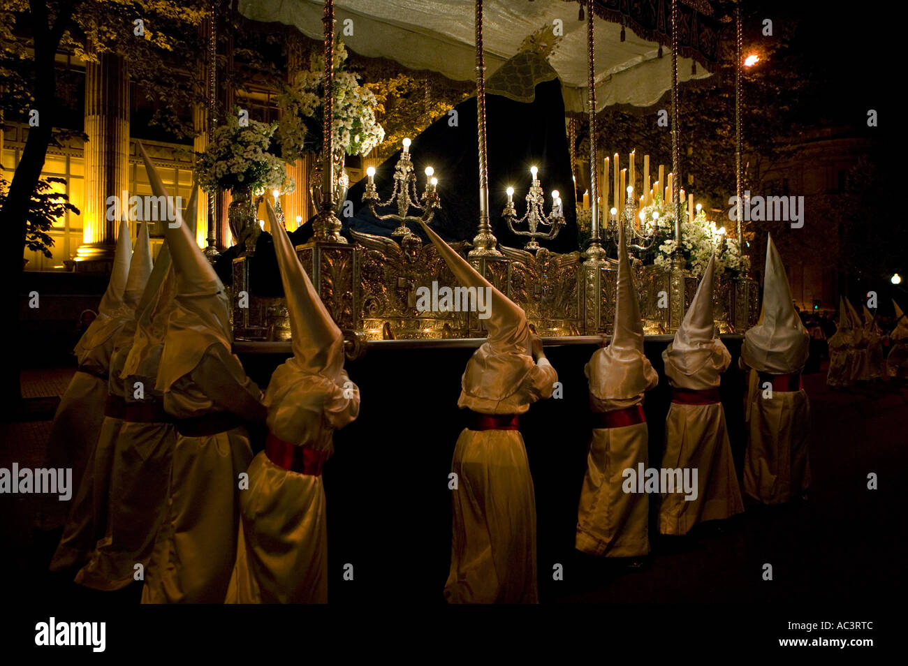 Illuminated float passing down Gran Via at night during Palm Sunday ...