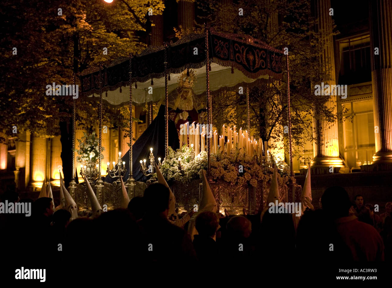 Illuminated float passing down Gran Via at night during Palm Sunday ...