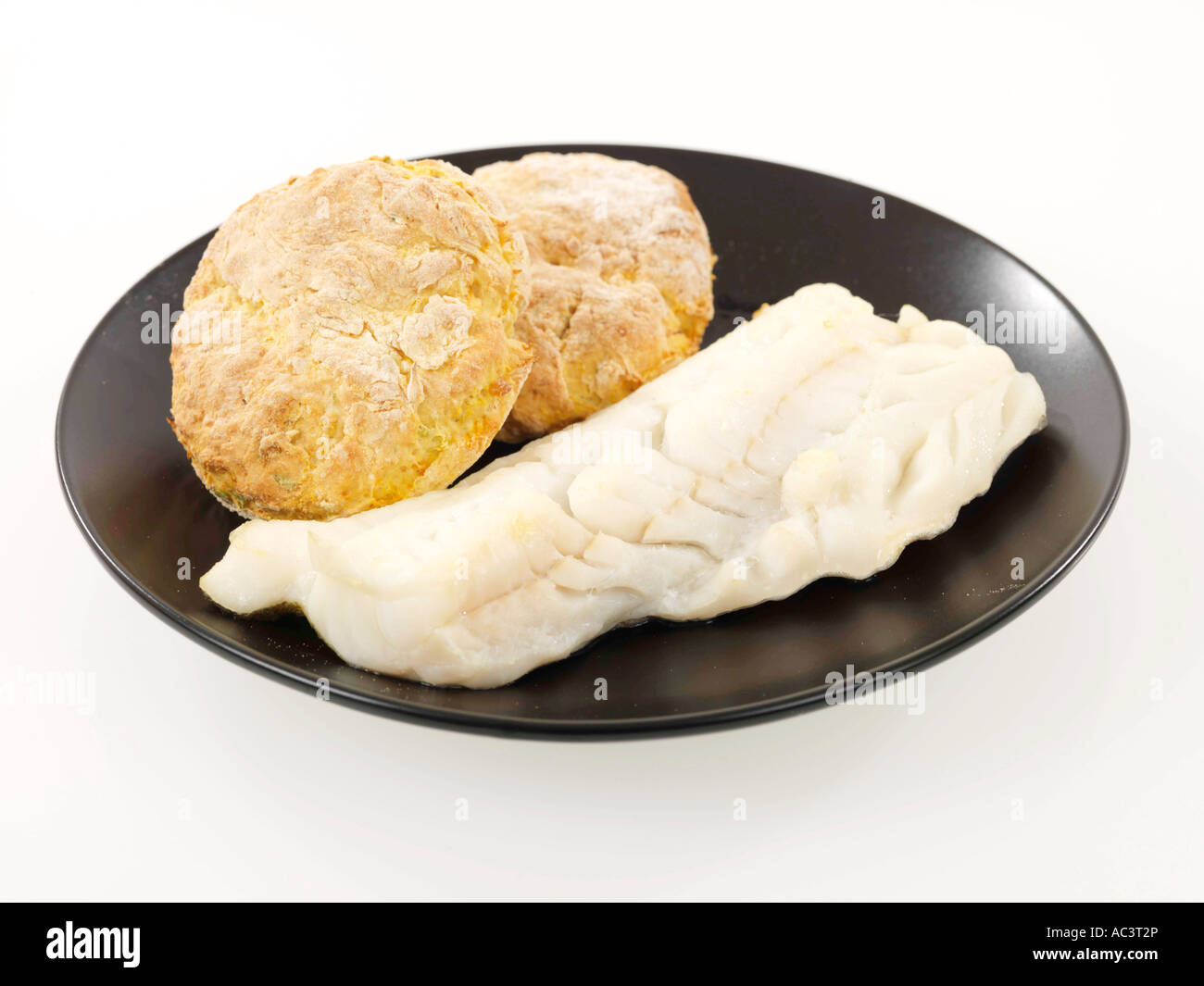 Grilled Cod with Green Vegetable Biscuits Stock Photo - Alamy