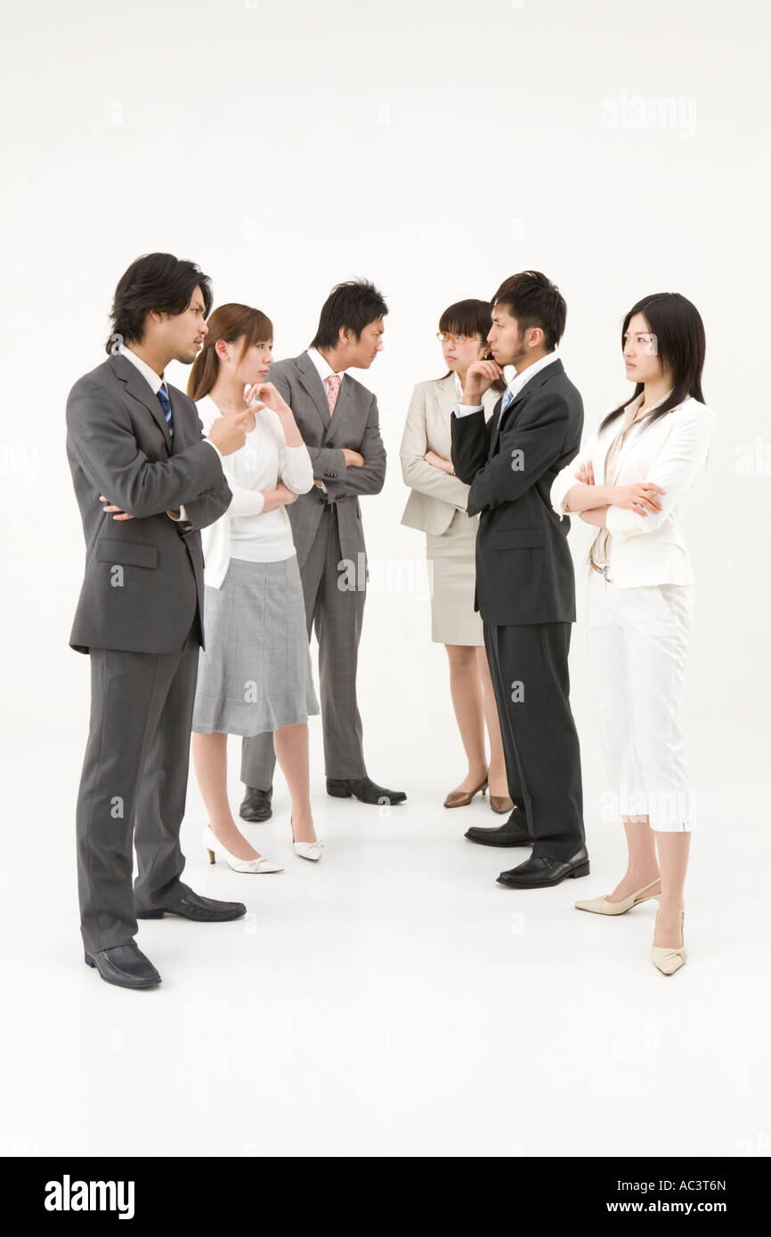 Business people glaring at each other Stock Photo - Alamy