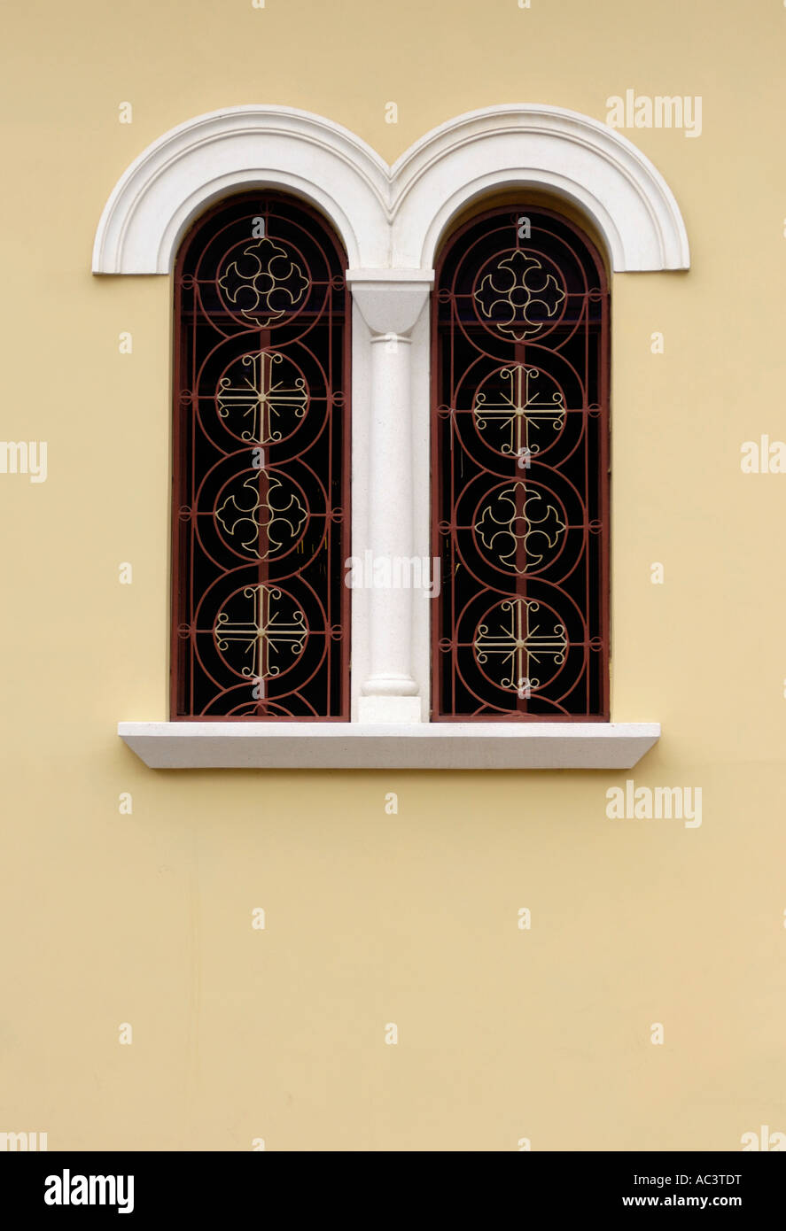 Wall with narrow arched windows Stock Photo - Alamy
