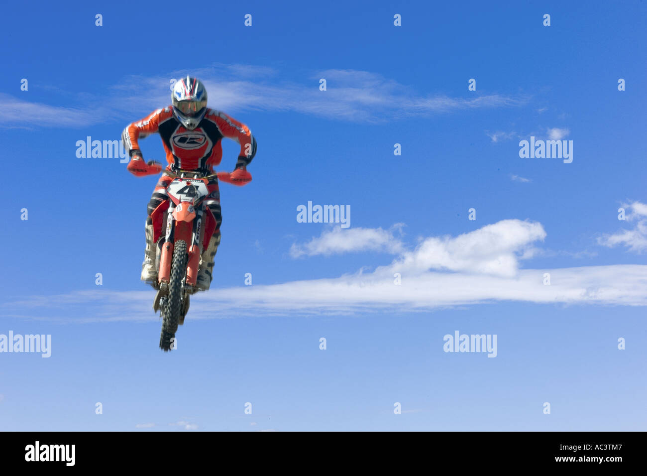 jump of moto cross driver Stock Photo - Alamy