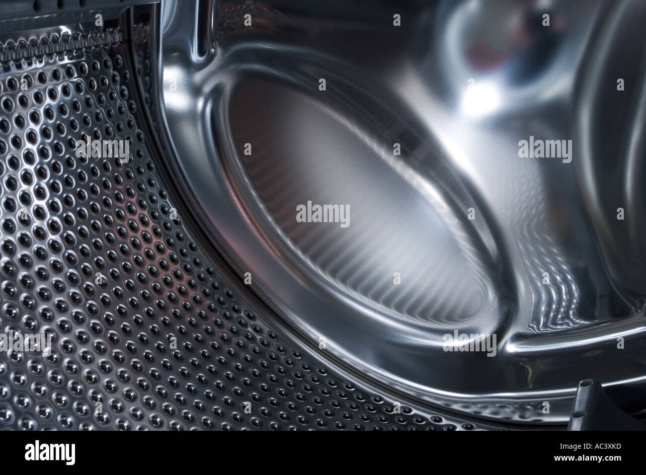 stainless steel washing machine drum Stock Photo - Alamy