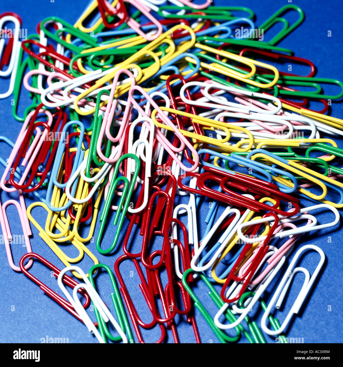 Multicoloured paperclips hi-res stock photography and images - Alamy