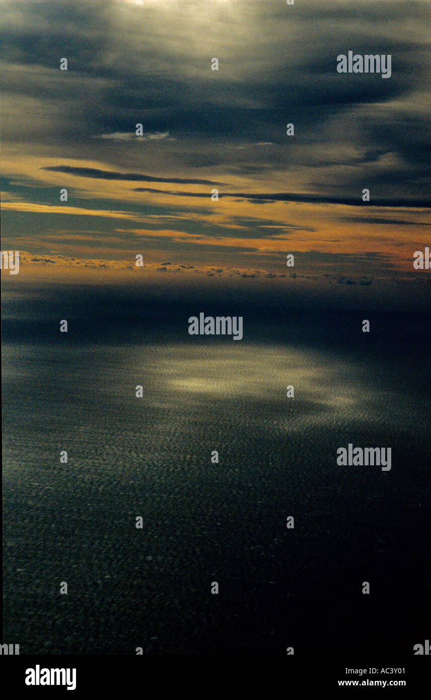 Vertigo sunset ocean flight infinity Stock Photo - Alamy