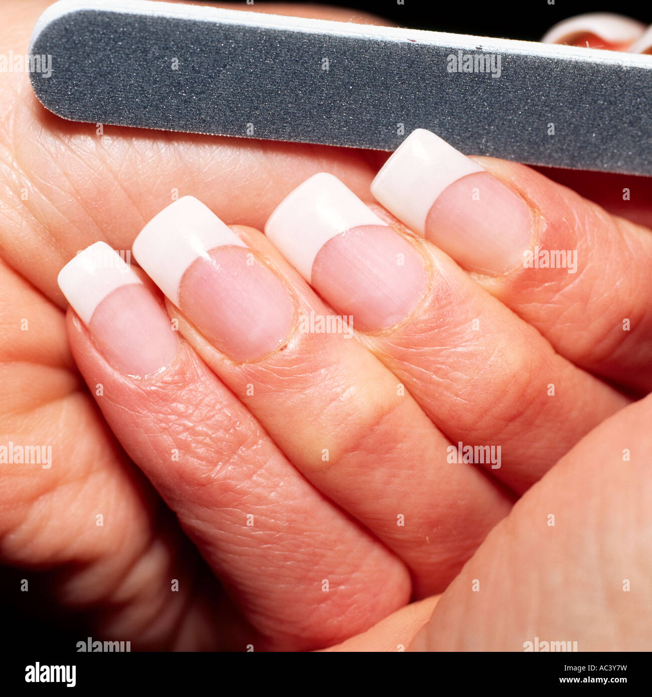 Young Woman Filing Fingernails Model Released Stock Photo - Alamy