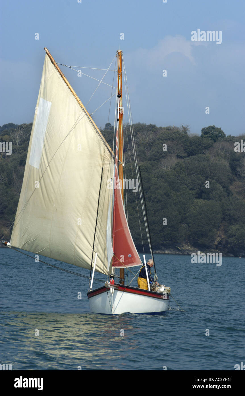 A traditional oyster dredger sailing boat at work in Carrick Roads in ...