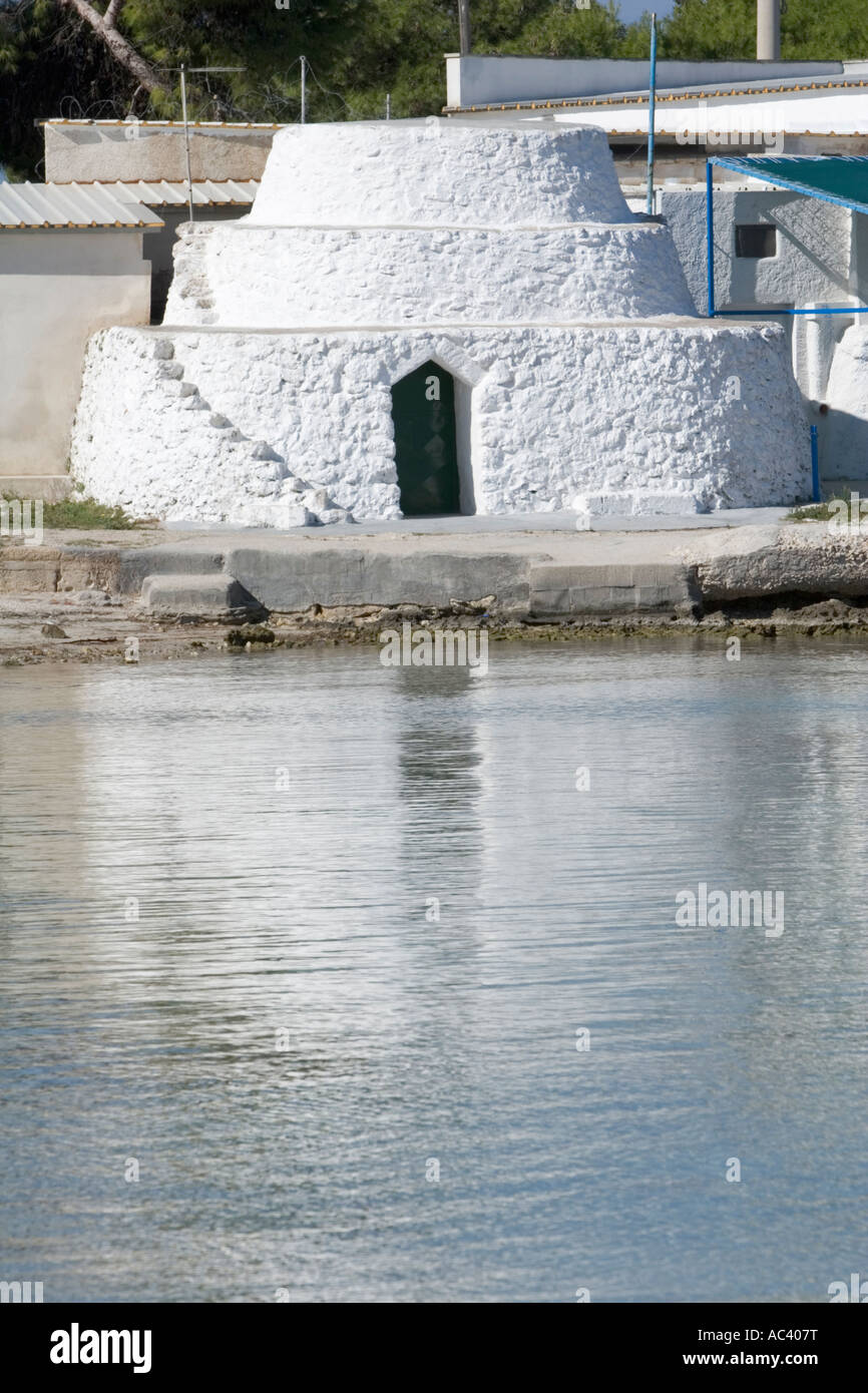 traditional building on the beach of Isidoro, Puglia, Italy Stock Photo ...