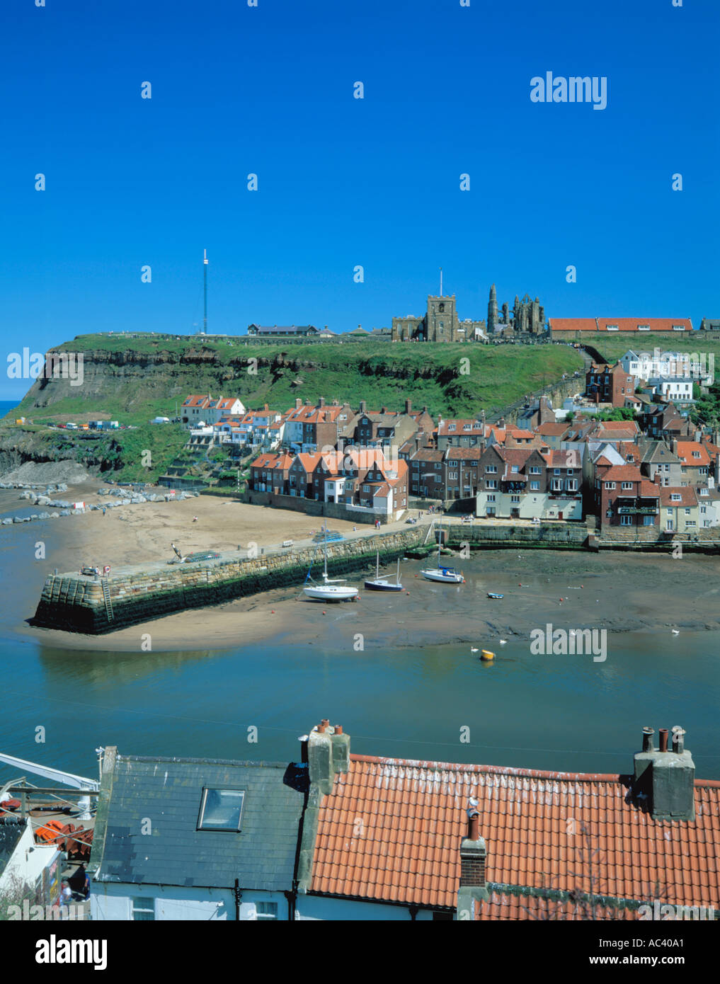 View over the River Esk and harbour entrance to Whitby Abbey, from the ...