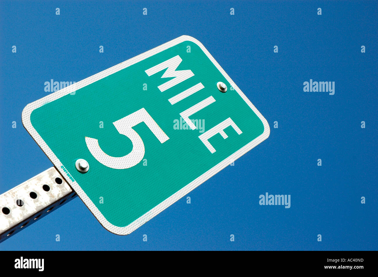 5 mile distance marker sign on freeway highway Stock Photo - Alamy